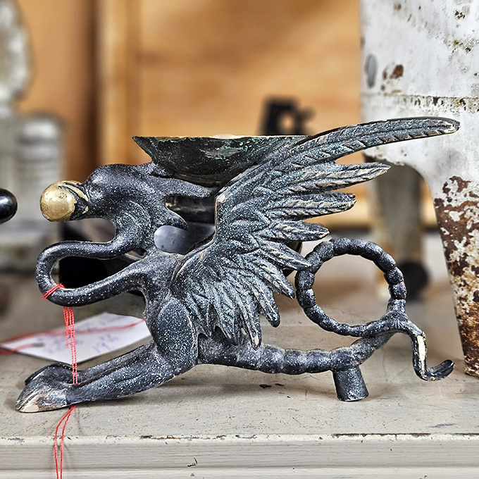 This metal dragon figurine isn't just decorative&mdash;it's conversation starter, bookend, and proof you have more interesting taste than your neighbor with the garden gnomes. 