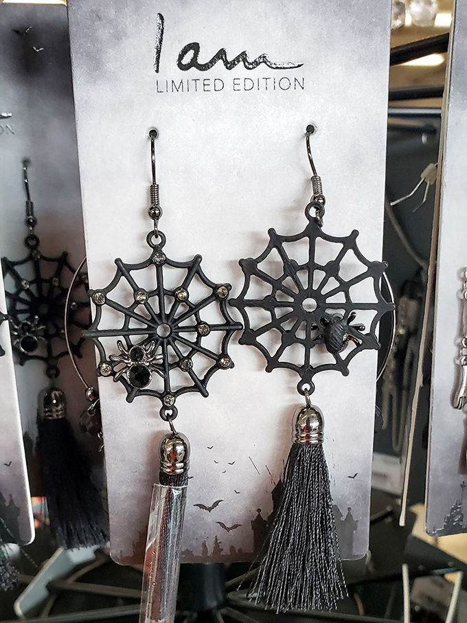 Spider web earrings that would make Wednesday Addams proud. Halloween accessories in July? That's the magic of thrift shopping.