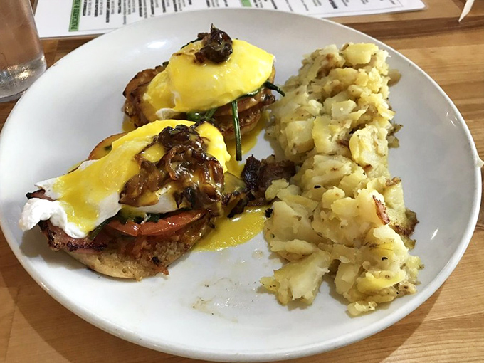 Eggs Benedict: the aristocrat of breakfast that somehow makes runny yolks seem sophisticated. Paired with those crispy potatoes, it's morning royalty.