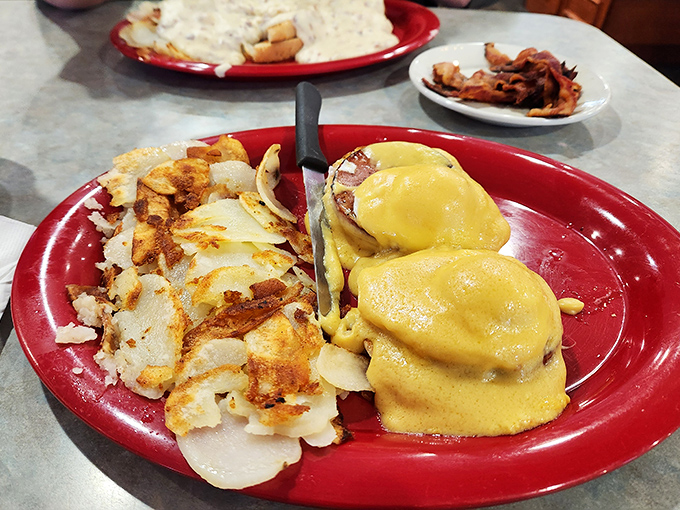 Eggs Benedict that makes you question why you'd ever attempt making hollandaise at home. Those home fries deserve their own fan club.