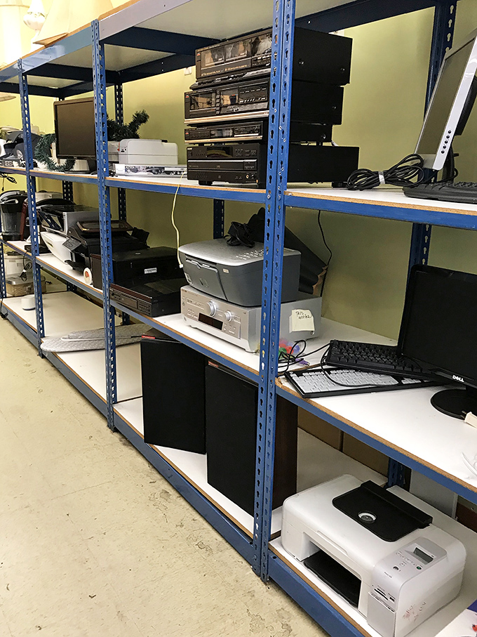 Yesterday's technology awaits new purpose on these blue shelves. That vintage stereo system might just be someone's retro dream come true at a price that won't require financing.