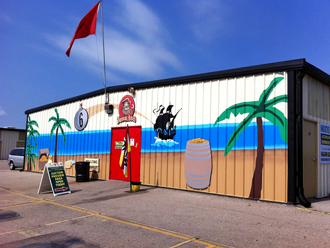 Pirate-themed paradise! This colorful building promises adventure within, complete with palm trees that somehow look right at home in the Midwest.