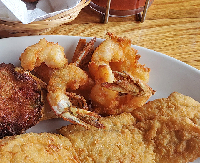 These fantail shrimp aren't just fried &ndash; they're transformed into crispy, golden treasures that snap between your teeth with oceanic sweetness.