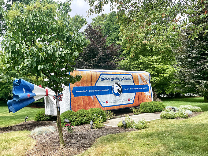 Not your average garden feature. The meticulous landscaping around this carb colossus creates a surreal juxtaposition that would make Salvador Dal&iacute; reach for a butter knife.