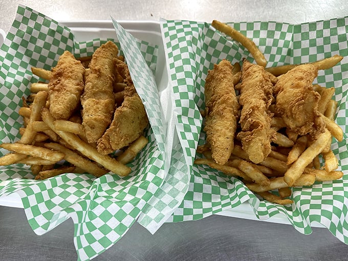 The fish fry that launched a thousand return visits. Golden, crispy perfection nestled alongside fries that deserve their own fan club.