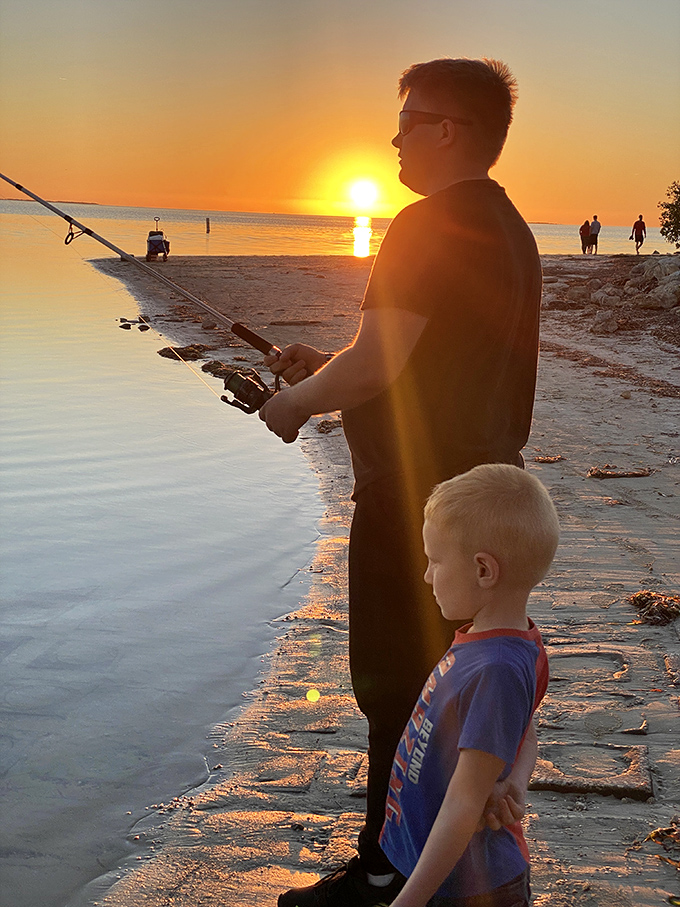 Teaching the next generation that patience is a virtue, especially when dinner might be swimming by.