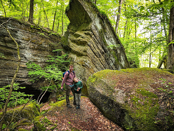 Two explorers discover what millions of years of patience looks like. These tilted rock formations tell Earth's story better than any textbook could.