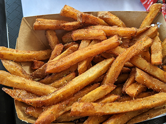 These aren't just fries; they're golden happiness sticks. Perfectly crisp outside, fluffy inside, and seasoned with what can only be described as magic.