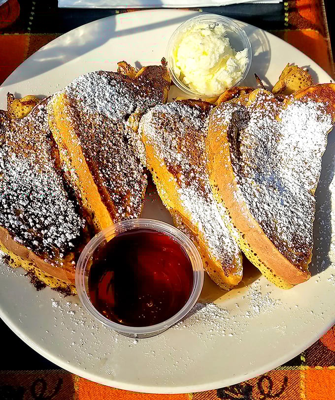 French toast so fluffy, it practically floats off the plate like a delicious cloud.