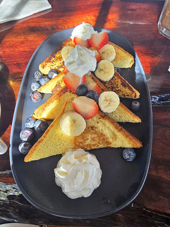 French toast that's dressed for success with fresh berries, bananas, and whipped cream. Breakfast or dessert? The line deliciously blurs here.