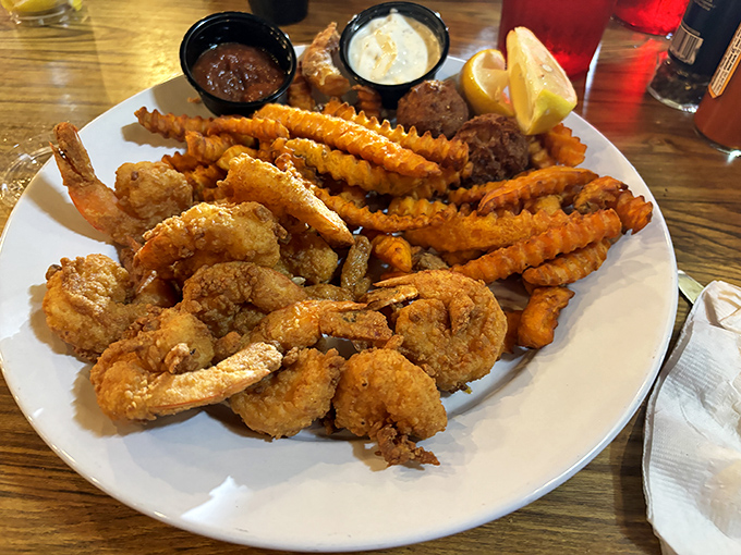 The seafood platter that answers the eternal question: "Why choose one fried delight when you can have them all?" Golden perfection on a plate.