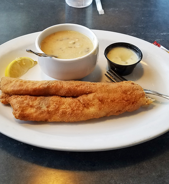 Lake Erie's finest walleye, transformed into golden perfection. That crispy exterior gives way to flaky fish that practically swims into your heart.