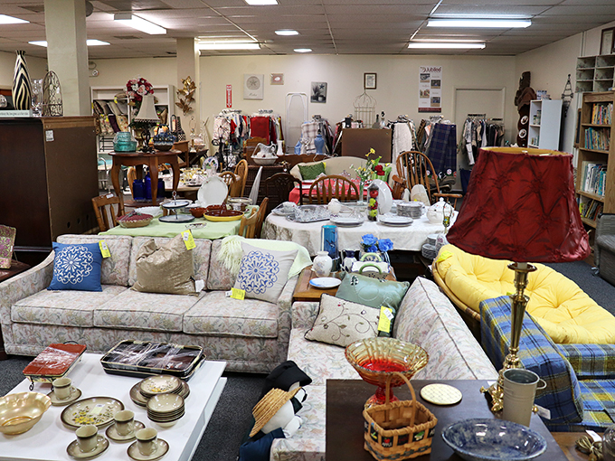 A living room tableau that makes you wonder if the Brady Bunch redecorated and then donated their entire set. That floral couch has stories to tell!
