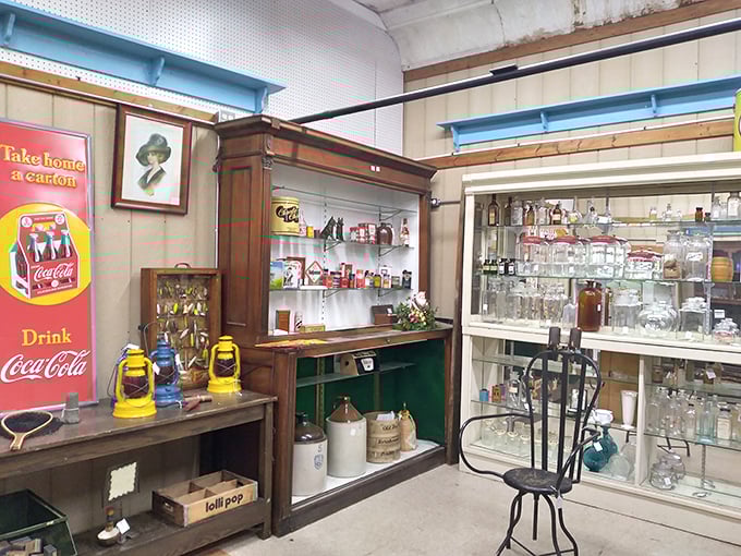 A Coca-Cola collector's dream corner where vintage advertising meets practical glassware &ndash; proof that marketing was an art form before digital existed.