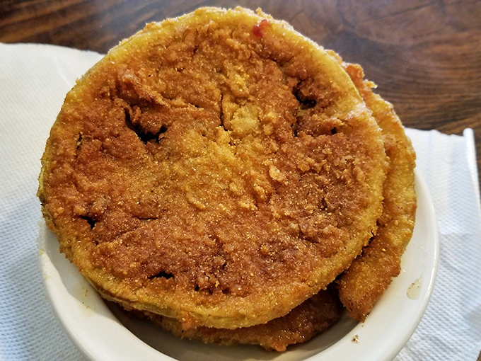 These aren't just fried green tomatoes; they're edible Southern history&mdash;crispy, tangy discs that make you wonder why we ever eat them red.