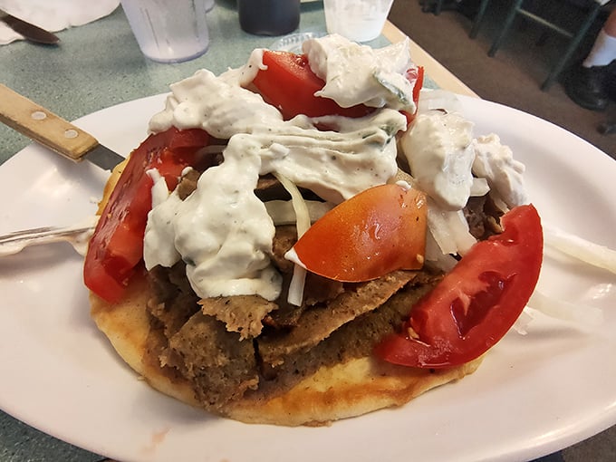 This isn't just a gyro, it's an architectural marvel of tzatziki, tomatoes, and seasoned meat on a warm pita foundation. Breakfast's Mediterranean cousin.