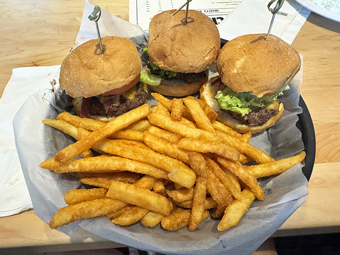 Burger sliders that don't slide on flavor &ndash; these hand-formed beauties arrive with golden fries that deserve their own fan club.