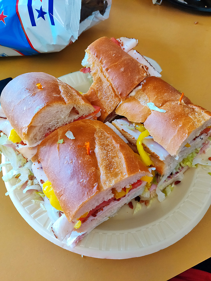 Layer upon glorious layer of meats and cheeses, these hoagies aren't just lunch &ndash; they're an edible engineering marvel worth driving across counties for.
