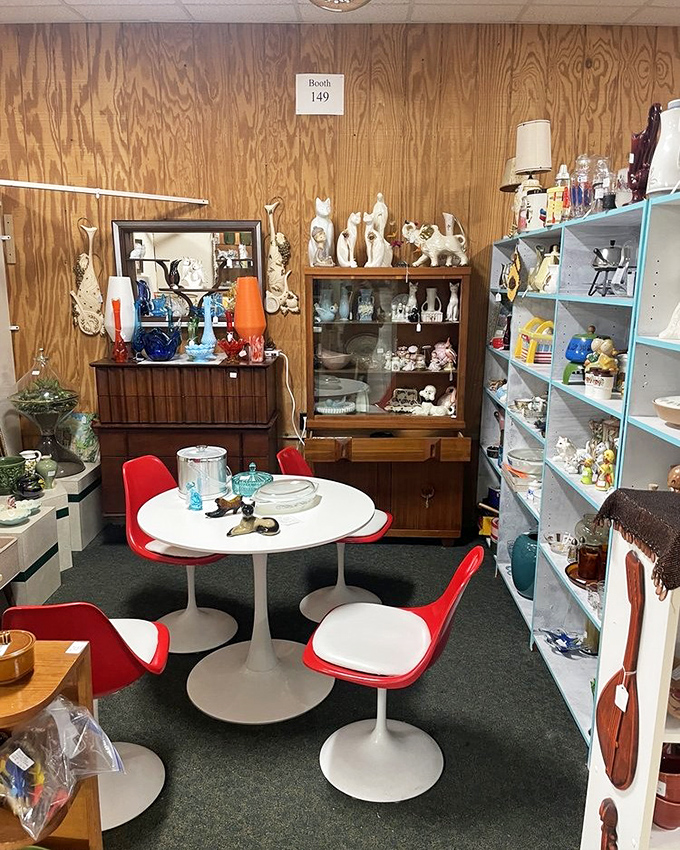 Booth 149 is a mid-century modern paradise. Those tulip chairs aren't just furniture&mdash;they're time machines to 1962.