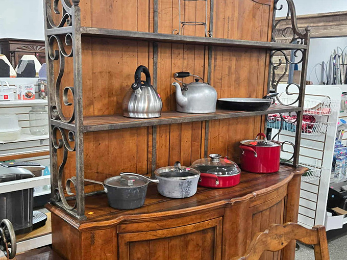 Vintage kettles and modern cookware cohabitate on this rustic hutch&mdash;like "The Odd Couple" but with better kitchen credentials.