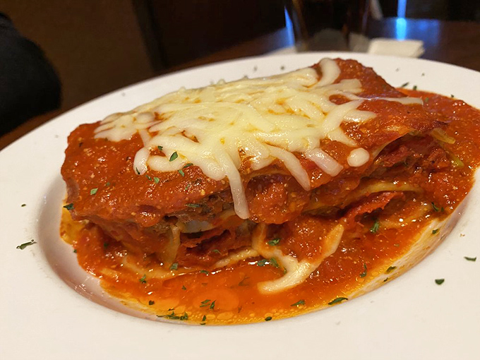 Behold the lasagna that launched a thousand road trips. Those layers aren't just pasta&mdash;they're chapters in a delicious story.