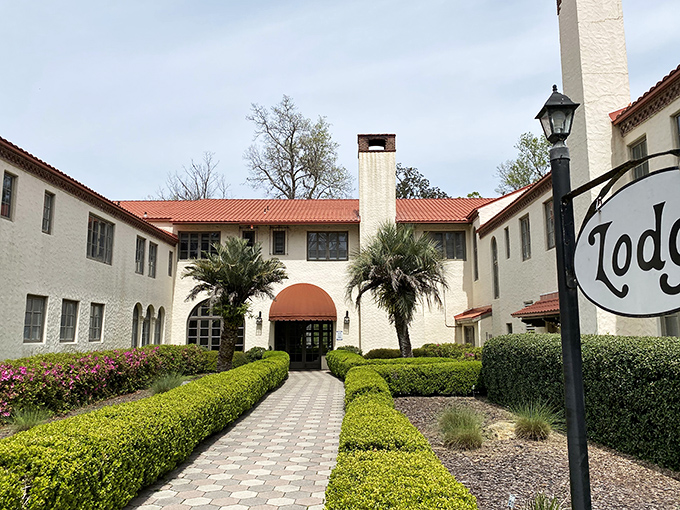The lodge entrance welcomes visitors like a warm hug from your favorite aunt's vacation home.