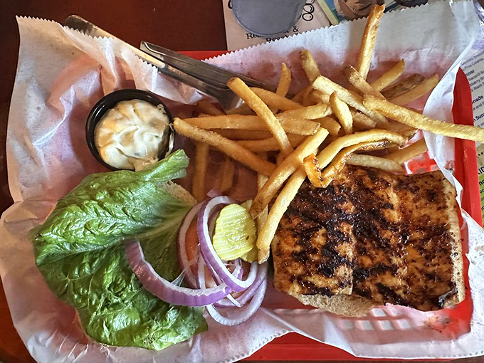 The Mahi sandwich arrives like a postcard from paradise&mdash;perfectly grilled, nestled on a bun with all the fixings a fish this good deserves.