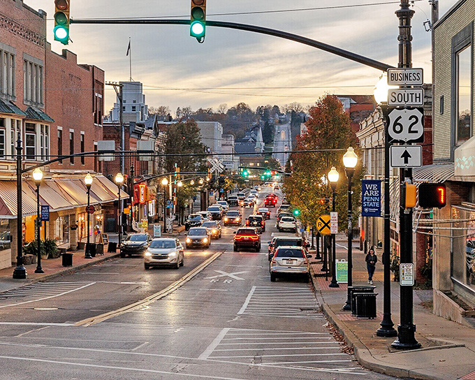 As evening settles on State Route 62, Sharon's streetlights flicker to life, transforming the business district into a postcard-perfect small-town scene.