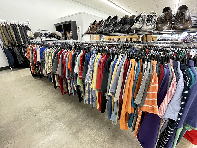 The men's section breaks the thrift store stereotype with orderly racks of quality shirts that look barely worn.