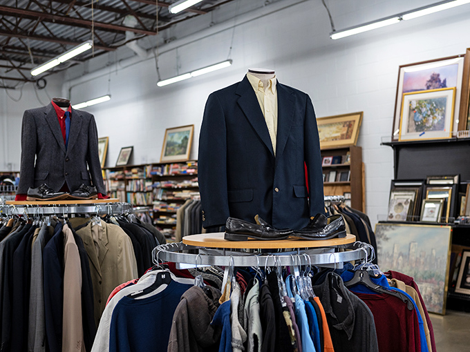 These dapper suits stand at attention, patiently waiting for their second act. That navy blazer could tell stories if fabric could talk.