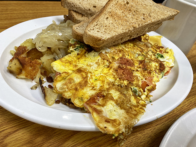 This omelet has achieved that mythical balance&mdash;crisp at the edges, fluffy within, and stuffed with fillings that complement rather than overwhelm.