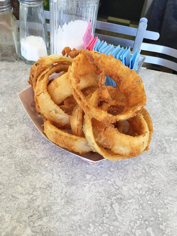 Golden halos of happiness that make you question why anyone would waste time with lesser onion rings. These are the real deal.