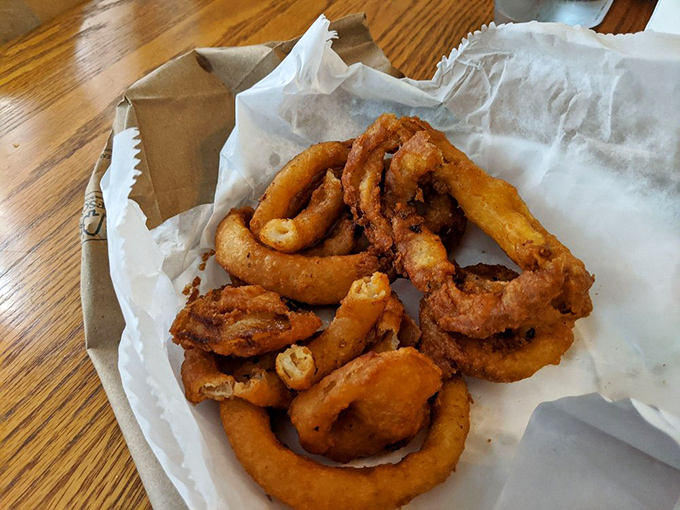 Golden, crispy onion rings that shatter with each bite. The perfect sidekick to a cheesesteak&mdash;like Abbott to Costello, but deliciously fried.