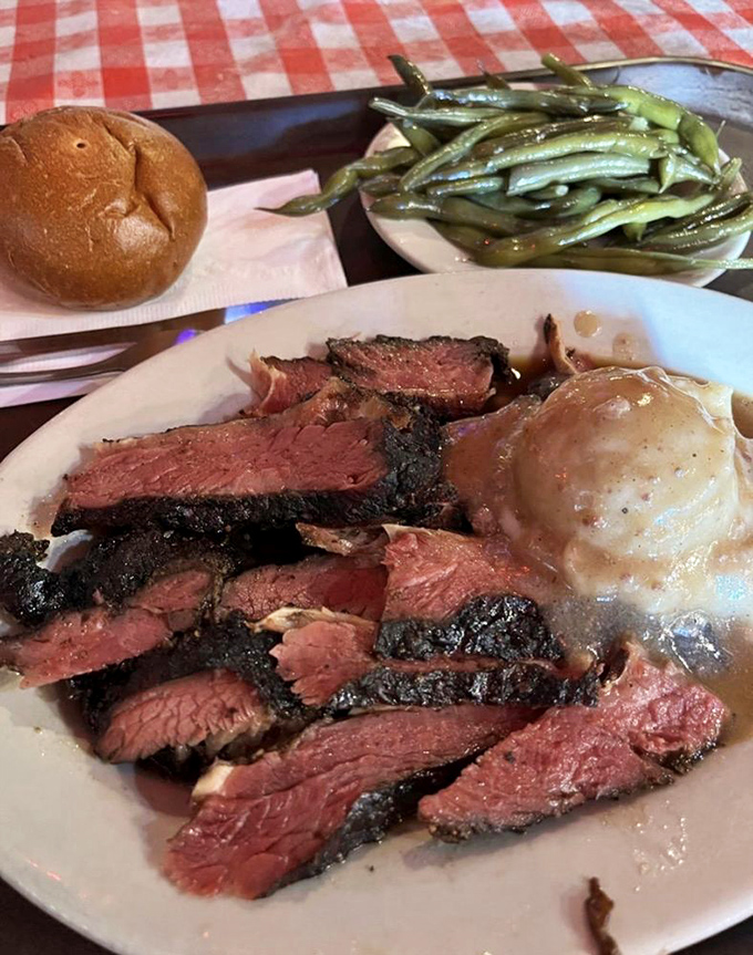 Sliced to perfection, this brisket doesn't need a filter or a fancy description. It's the kind of meat that makes vegetarians momentarily question their life choices.