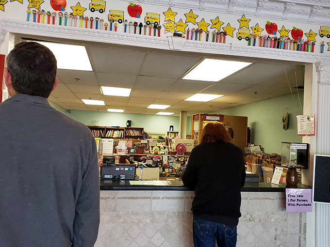 The checkout counter, where school bus decorations remind you that your bargain hunting directly supports local education. Guilt-free shopping at its finest!