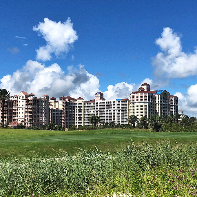 Hammock Beach Resort stands like a pastel-hued sentinel guarding the Atlantic – luxury that somehow feels approachable rather than intimidating.