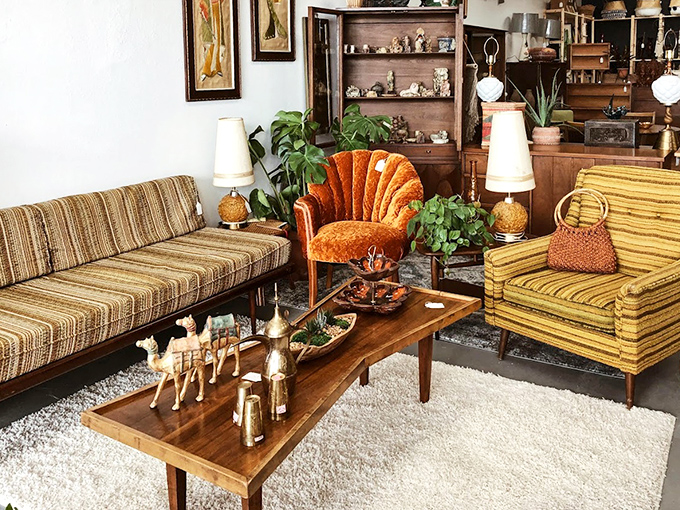 This isn't a living room setup&mdash;it's a time machine to 1968. That orange channel-back chair is practically begging for a martini.