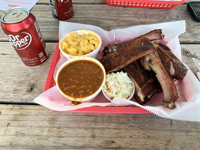 Ribs, mac and cheese, and baked beans &ndash; the holy trinity of barbecue companionship, best enjoyed with a Dr. Pepper and zero regrets.