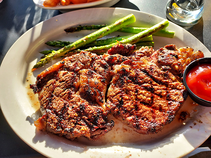 This isn't just a steak&mdash;it's a masterclass in meat preparation. Those grill marks aren't decoration; they're flavor geography mapping out your next several moments of pure bliss.