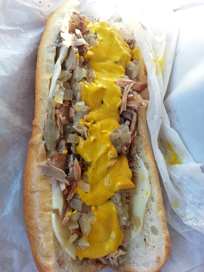 Cheez Whiz cascading like a golden waterfall over thinly sliced meat&mdash;a sight that makes Philadelphians weak in the knees.