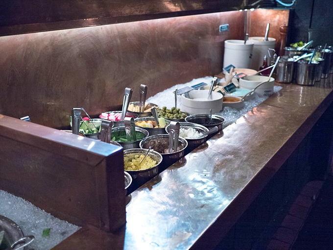 The salad bar at Sperry's – where vegetables get the respect they deserve before you demolish a massive steak. Balance in all things