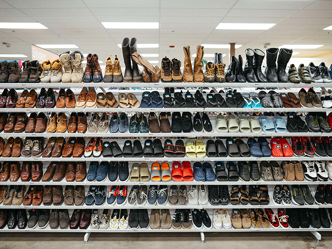 The shoe wall stands like a monument to every journey taken&mdash;work boots to wedding heels, all seeking new adventures.