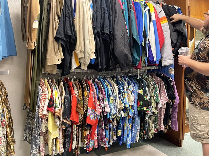 A rainbow of vintage Hawaiian shirts awaits new adventures. These fabrics have seen more interesting days than anything in your current closet.