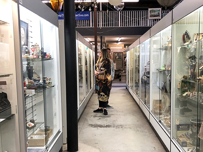 The glass display corridor: where jewelry hunters prowl with the focused intensity of archaeologists discovering a new ancient civilization.
