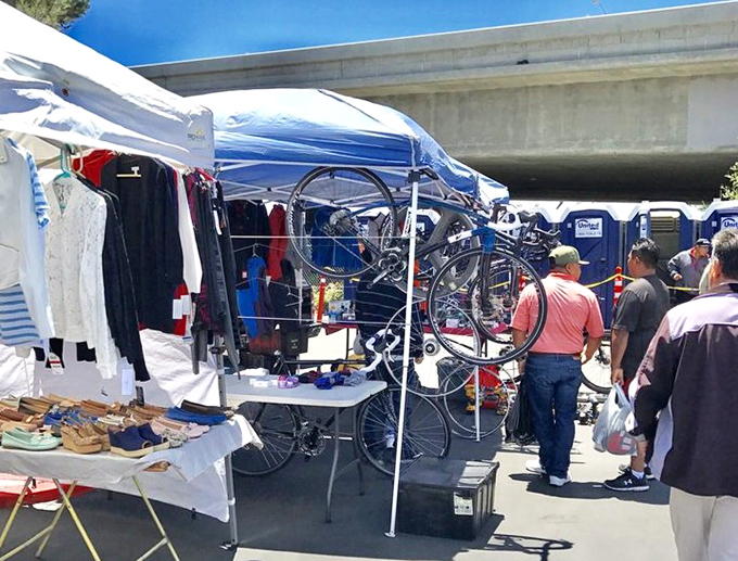 The art of the browse in full swing. Bicycles, clothing, and curiosities create the perfect backdrop for Oakland's weekend ritual of discovery and deal-making.