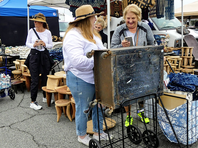Sunday shoppers on the hunt, proving that treasure hunting is definitely a spectator sport.