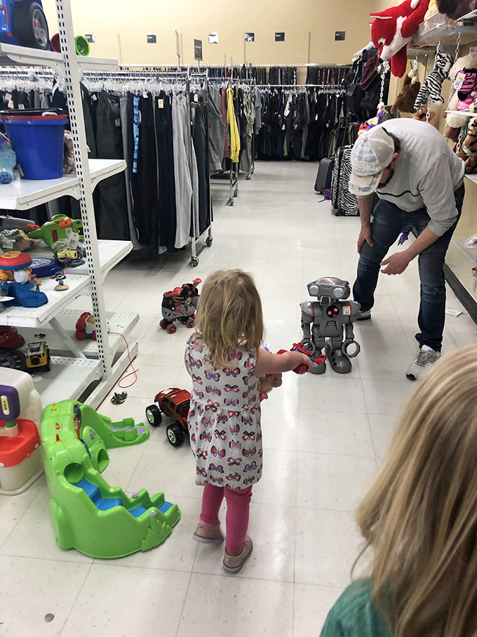 The toy section brings out the kid in everyone. That robot might have stories to tell from its previous life.
