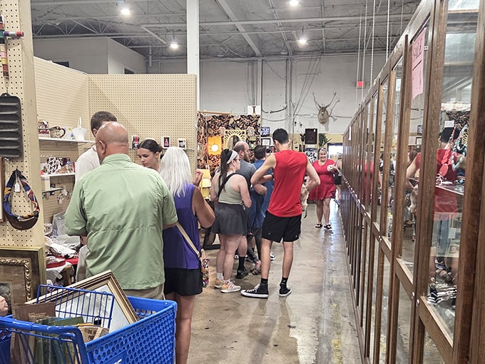 The universal language of antiquing: strangers united in the thrill of the hunt, each hoping to discover that perfect piece of yesterday.