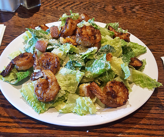 Caesar salad gets the VIP treatment with plump shrimp that clearly graduated from seafood finishing school.