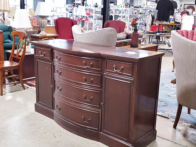 Solid wood craftsmanship that would make Ron Swanson proud. This sideboard has probably seen more family dinners than most of us.